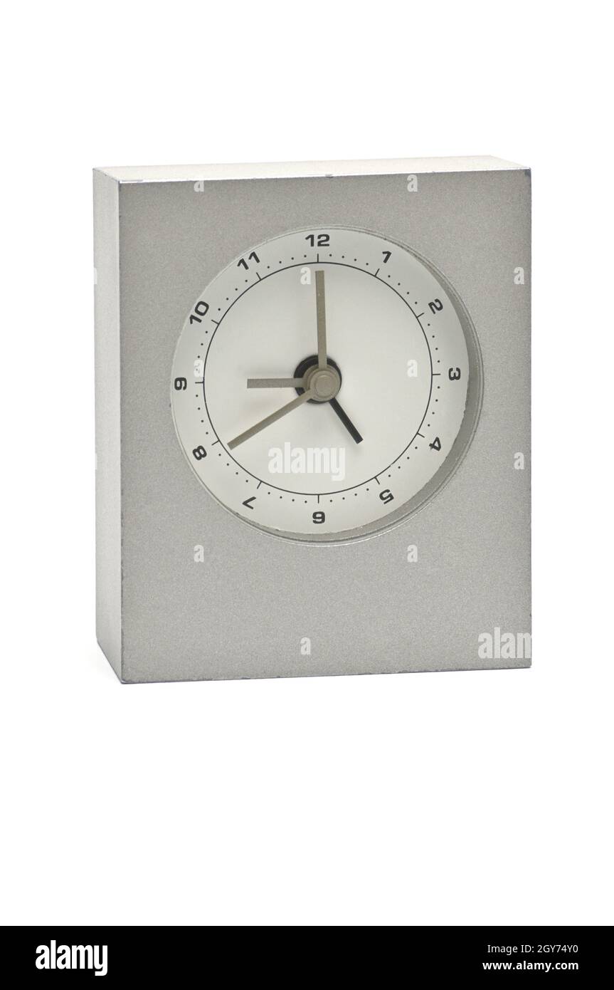 Silver metal clock on an isolated white background.Watch Stock Photo ...