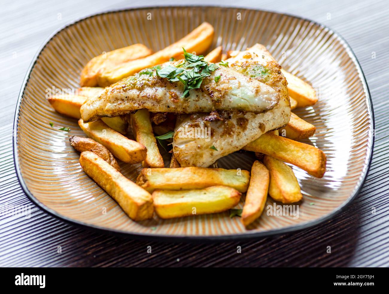 fried zander with homemade potato chips Stock Photo - Alamy
