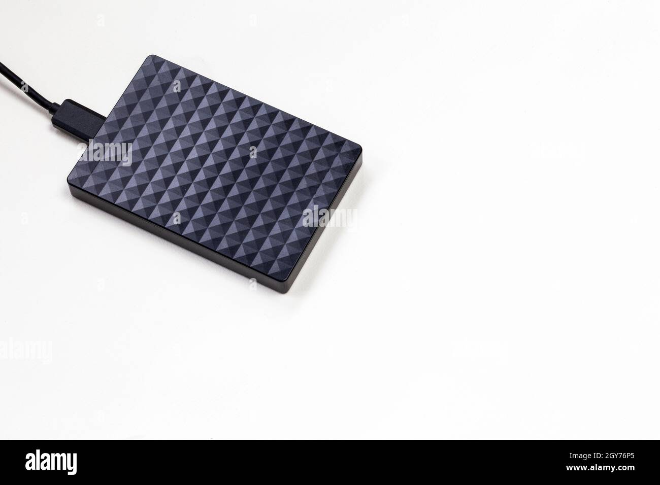 External hard disk drive isolated on white background, modern design ...