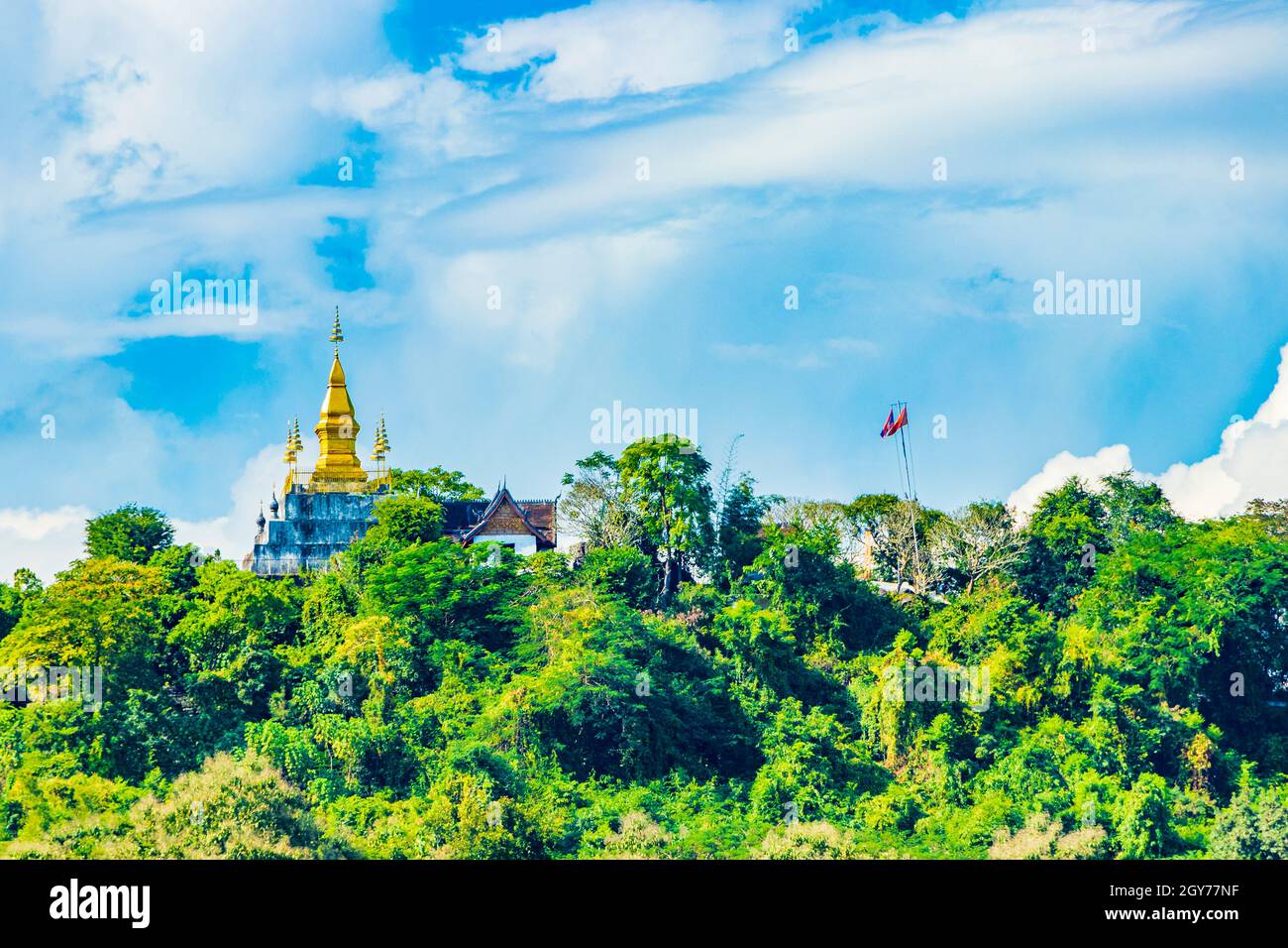 Panorama of the mountain Phousi Hill landscape and Wat Chom Si stupa in ...