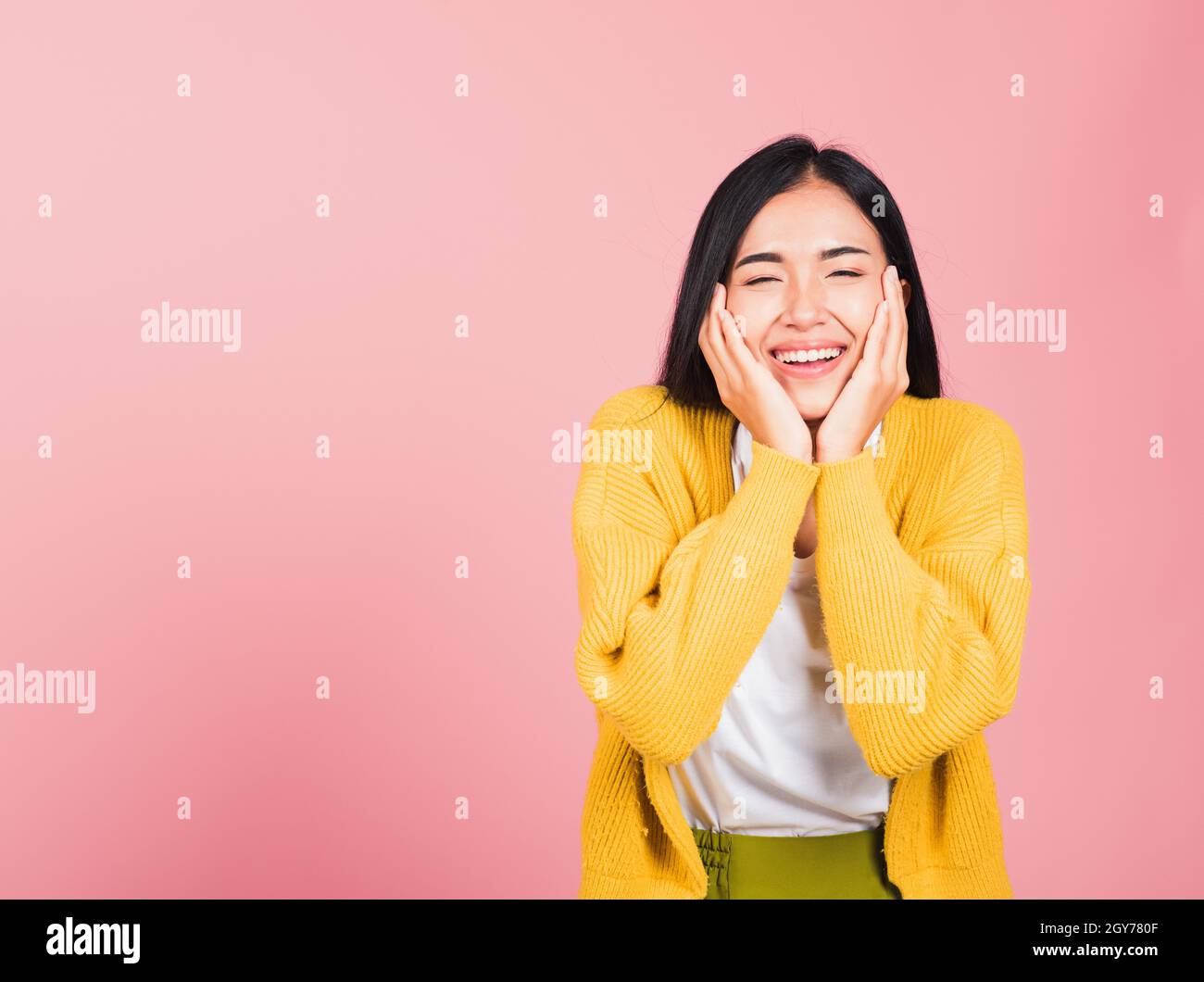 Happy Asian portrait beautiful cute young woman smile holding her ...