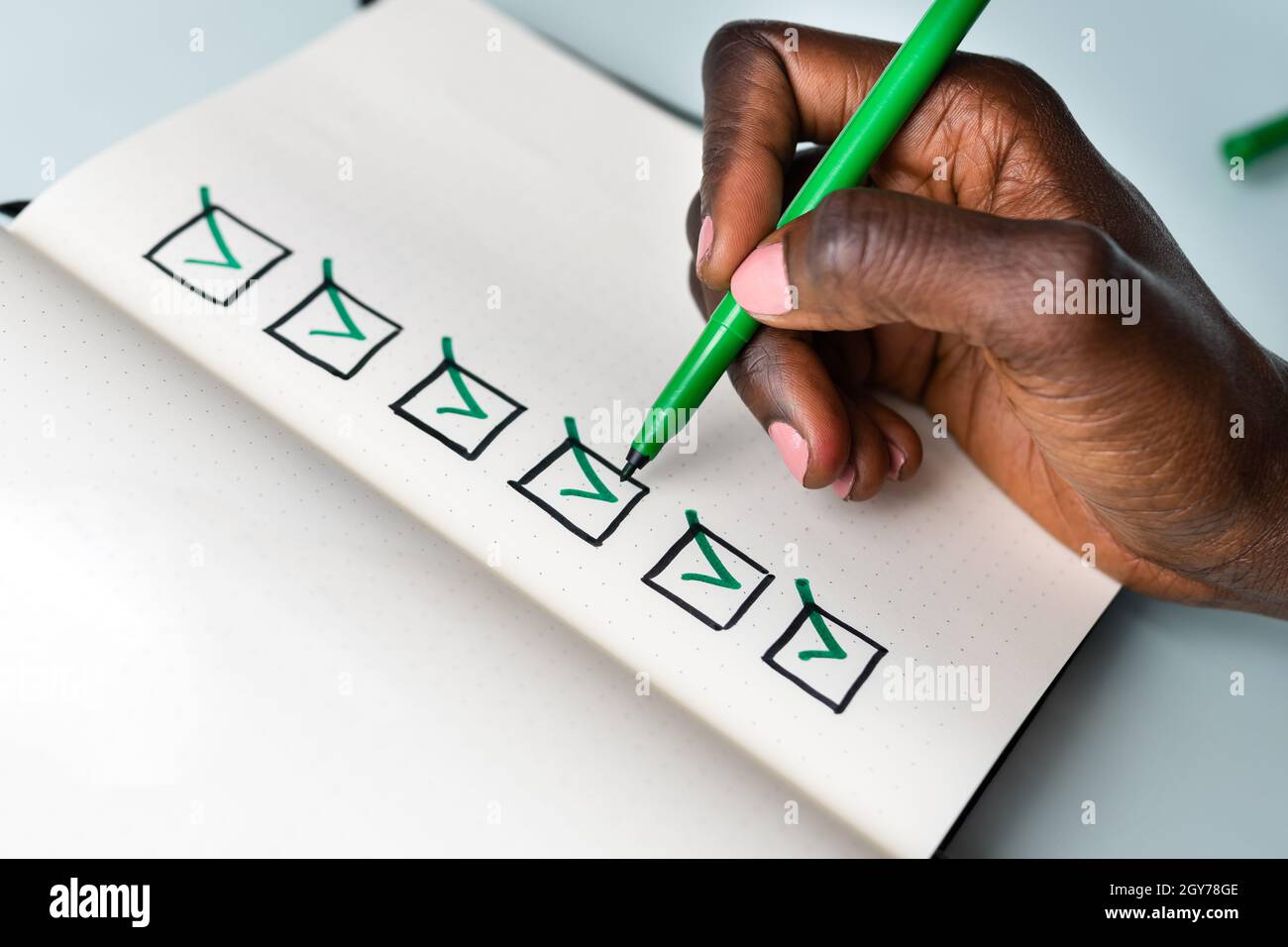 Business Plan Checklist. Hand Ticking Checkboxes At Work Stock Photo ...