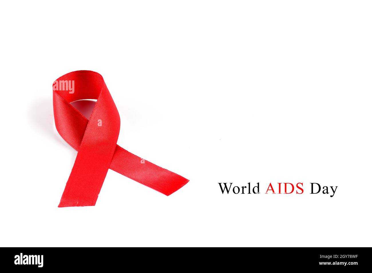 Aids Awareness Red Ribbon on white background Stock Photo - Alamy