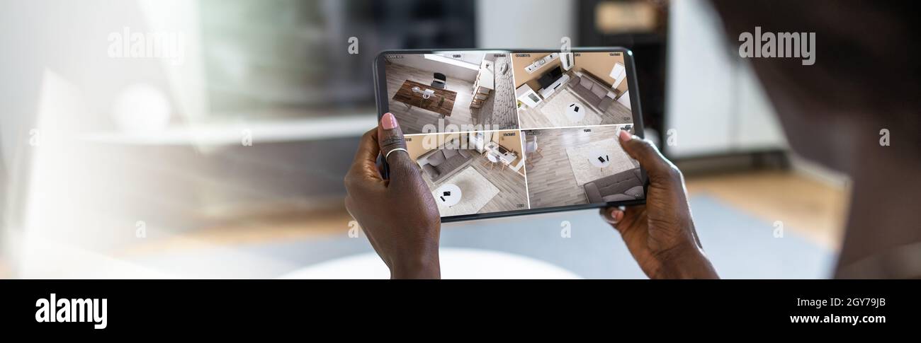 Security System CCTV Camera And Alarm Surveillance On Tablet Screen ...