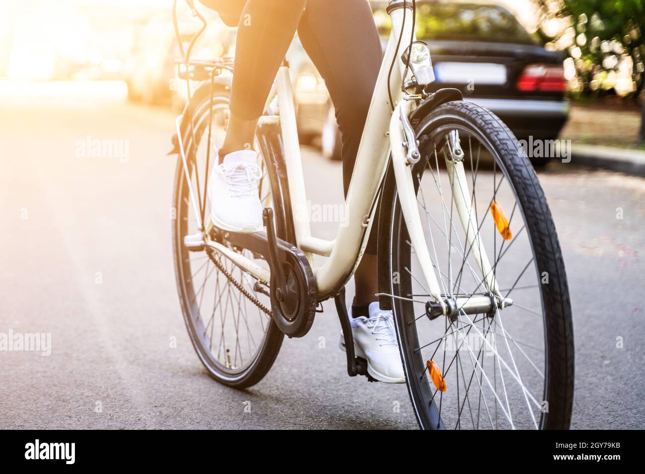 African American Woman Riding Bicycle Or Bike Stock Photo - Alamy