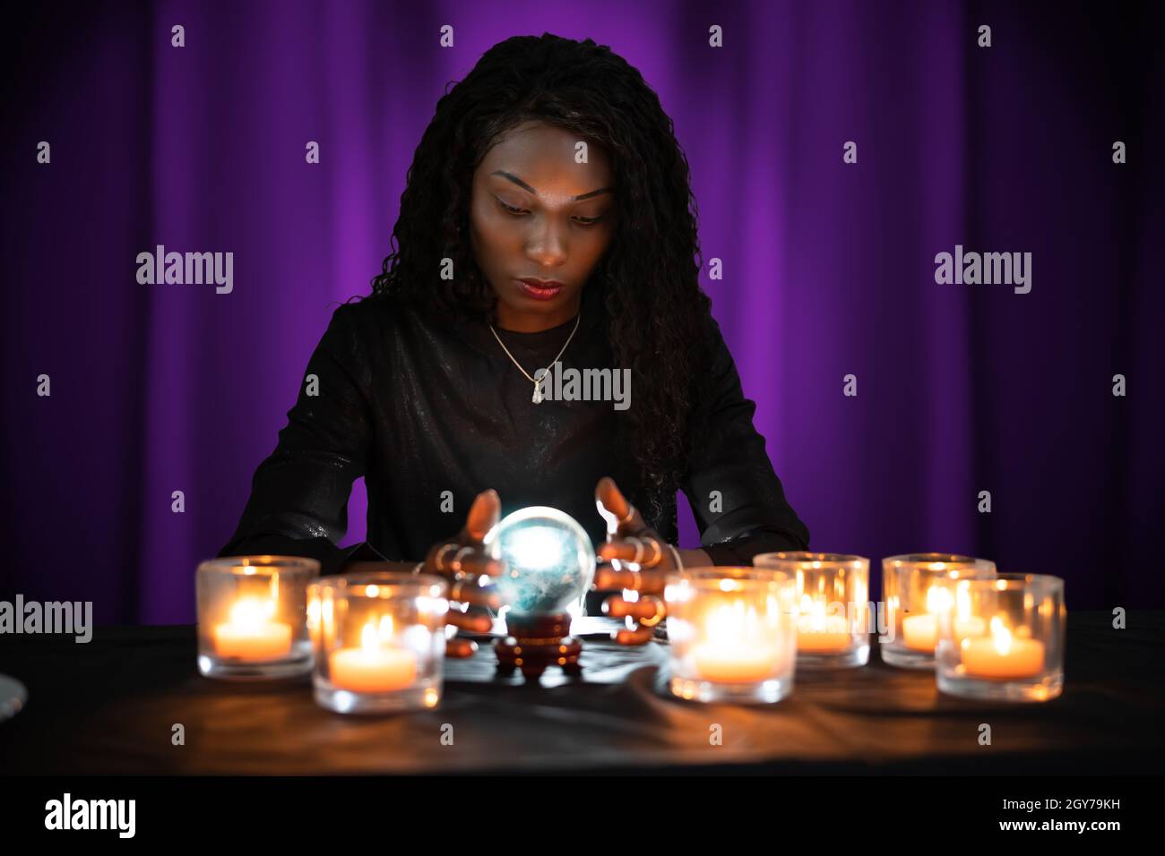 Fortune Teller Predicting Future Using Crystal Ball Stock Photo - Alamy