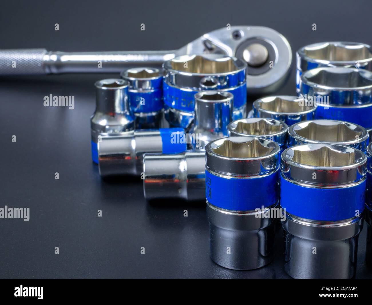 block wrench set and ratchet wrench on a black background Stock Photo ...