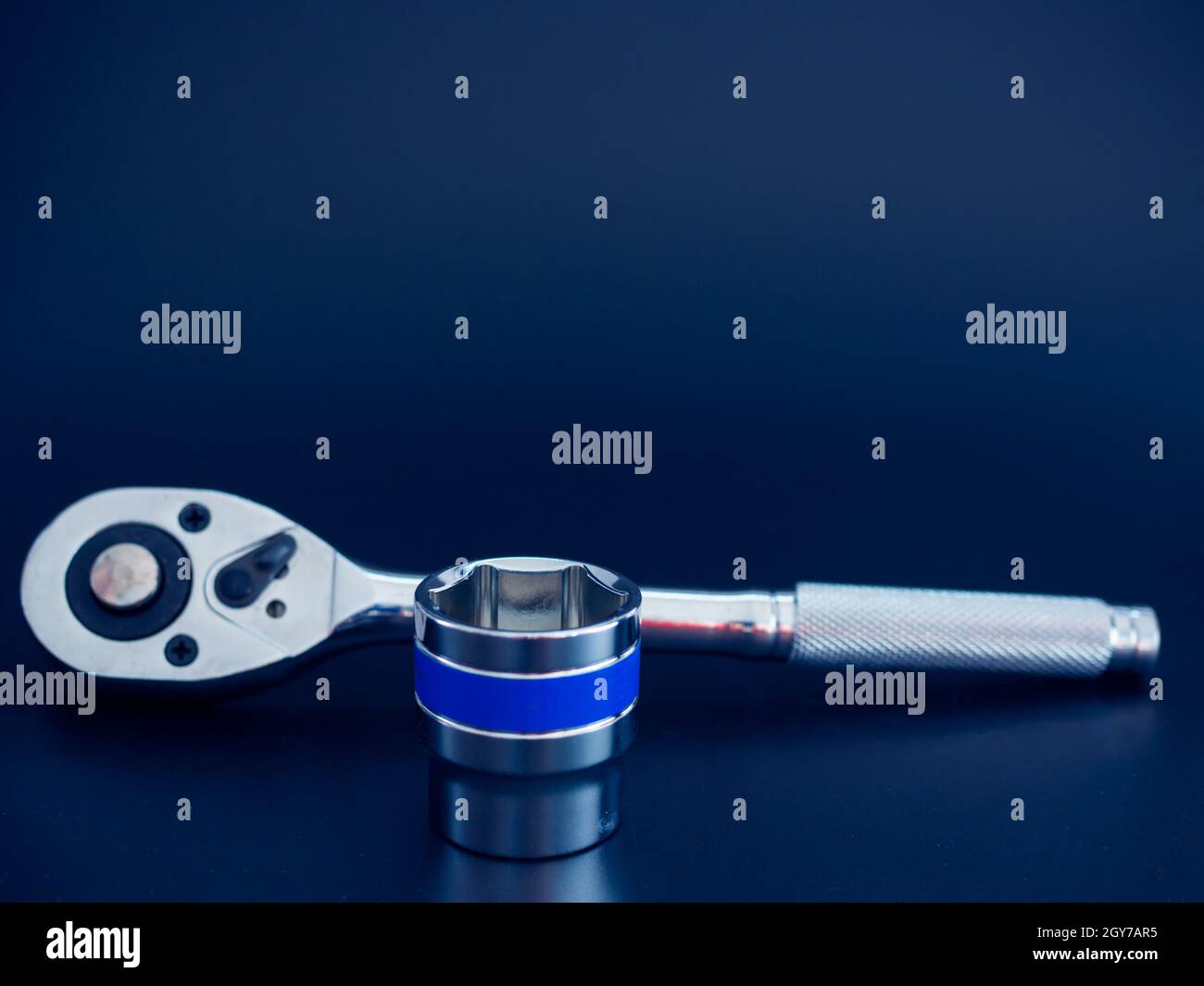 block wrench set and ratchet wrench on a black background.Block wrench ...