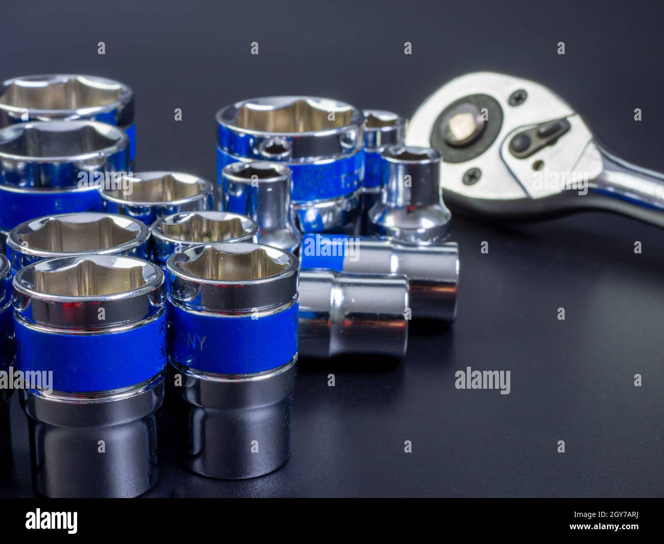 block wrench set and ratchet wrench on a black background Stock Photo ...