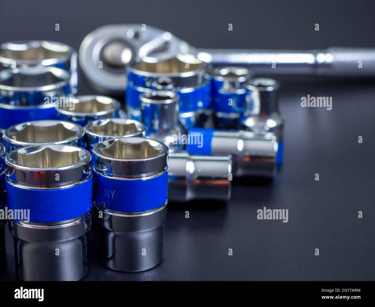 block wrench set and ratchet wrench on a black background Stock Photo ...