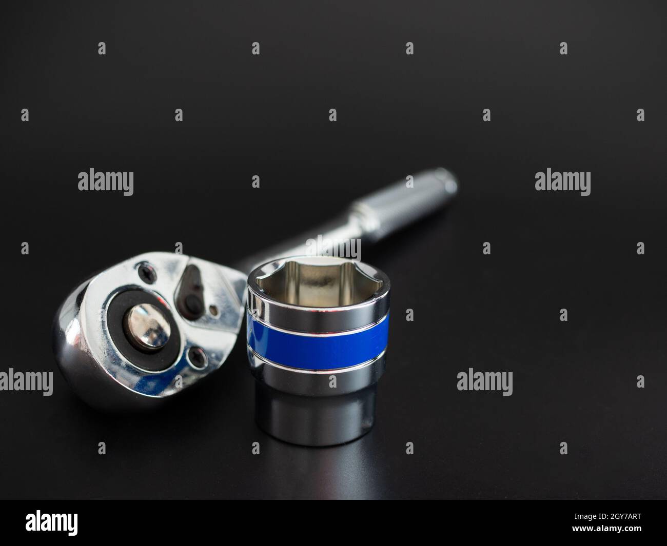 block wrench set and ratchet wrench on a black background.Block wrench ...