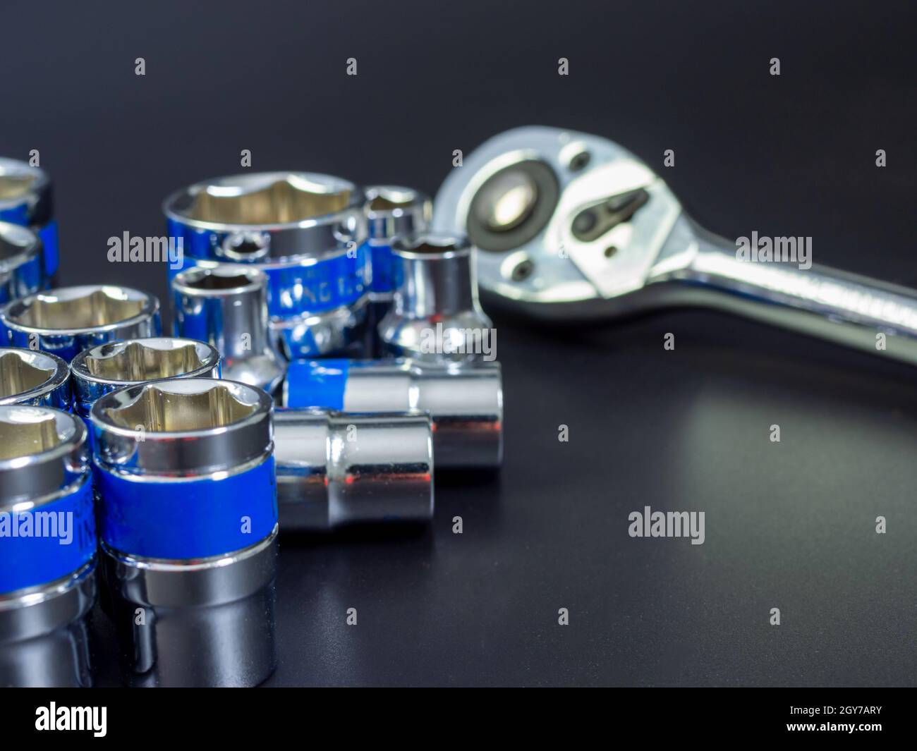 block wrench set and ratchet wrench on a black background Stock Photo ...