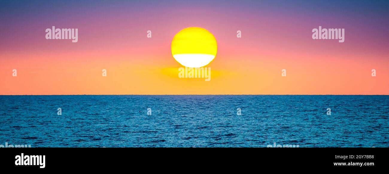 Scenic sunset by the mediterranean sea, Italy Stock Photo - Alamy