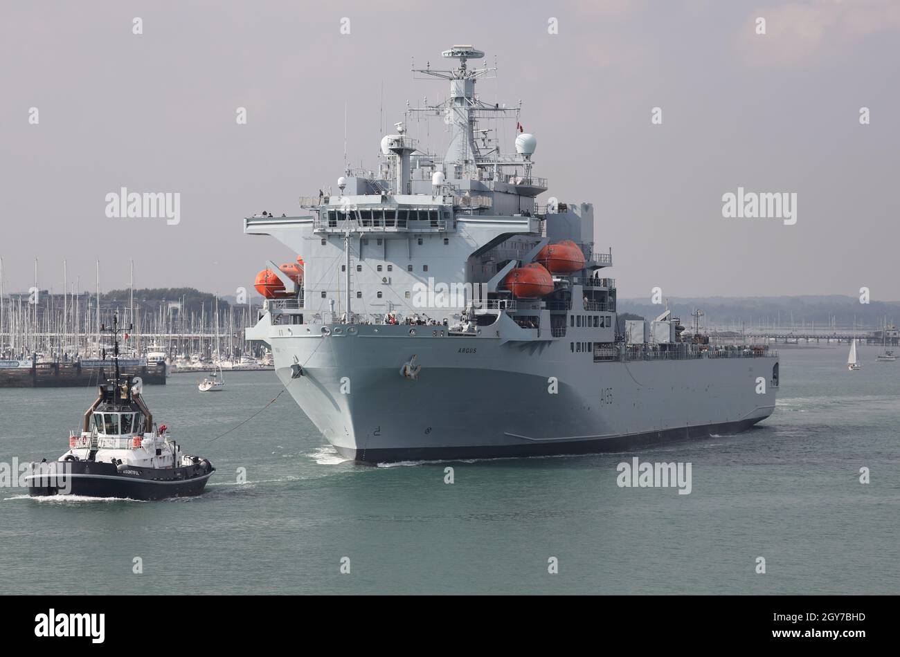 The Royal Fleet Auxiliary ship ARGUS heads towards the harbour mouth ...