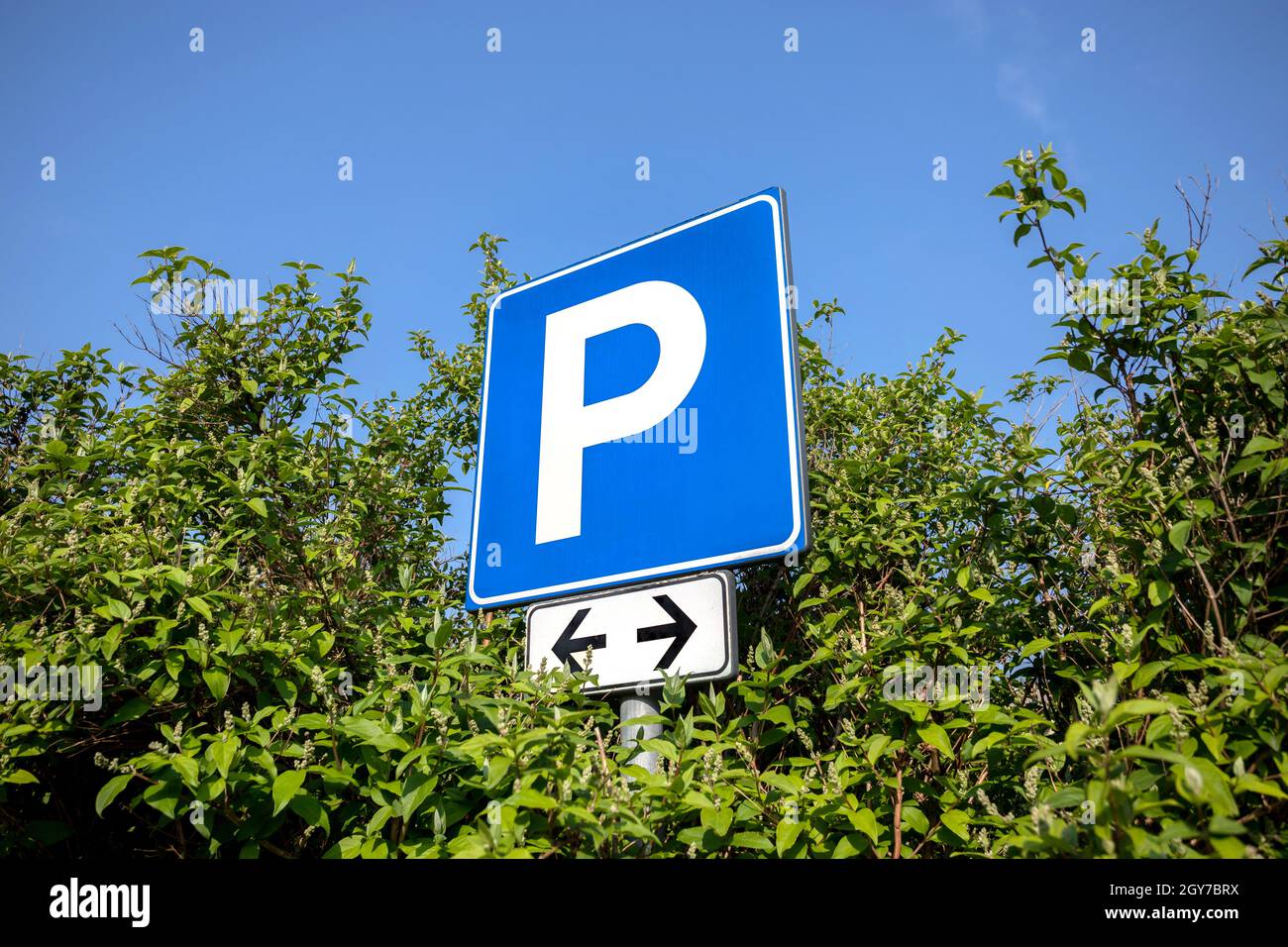 Parking sign showing free places Stock Photo - Alamy