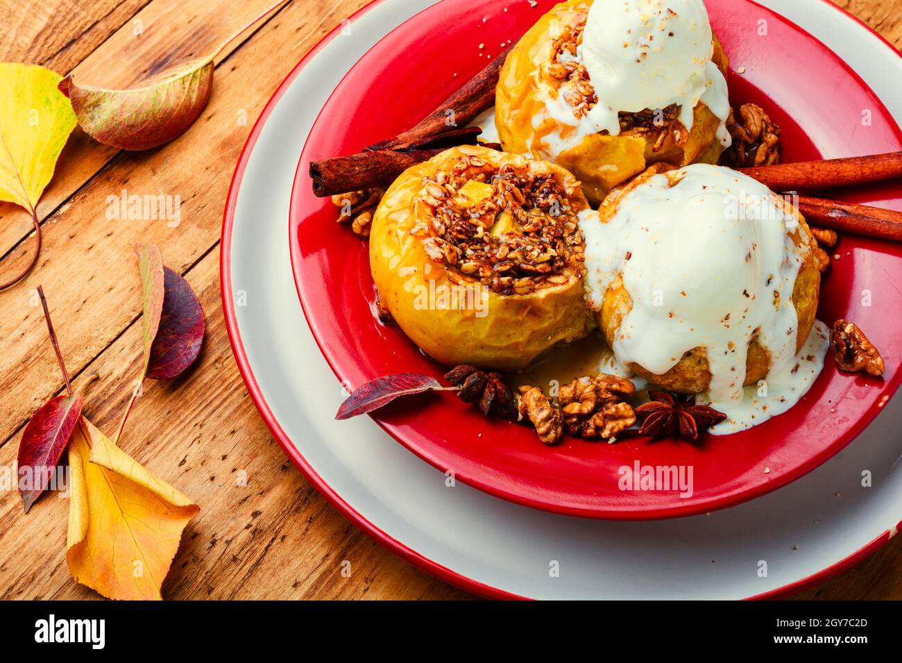 Autumn dessert, baked apples with granola and nuts.Tasty baked apples ...