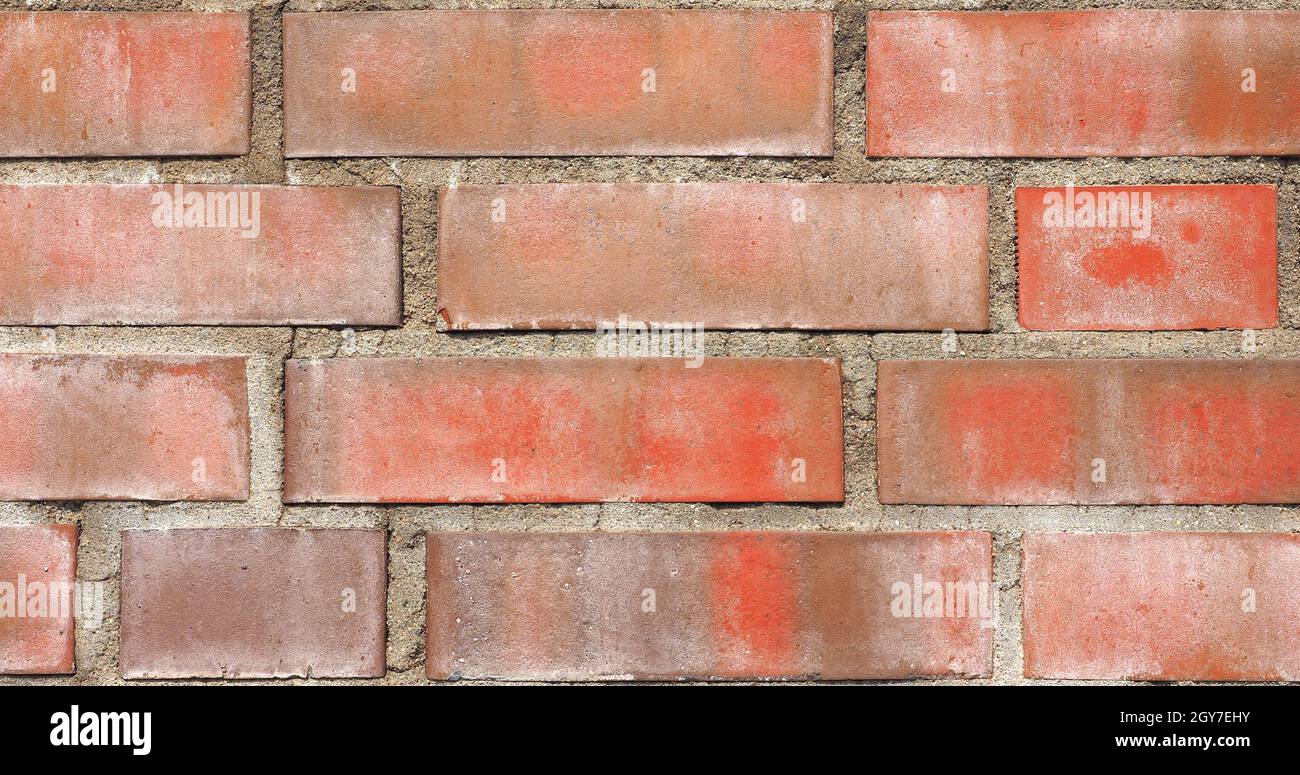 wide 4K red brick wall useful as a background Stock Photo - Alamy