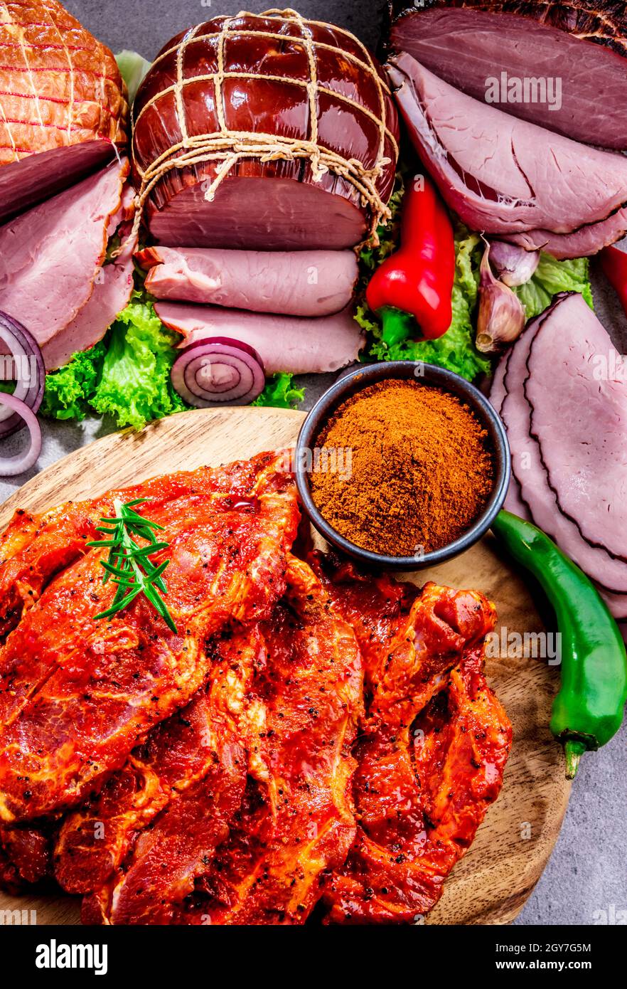 Composition with assorted meat products including ham, sausage and ...