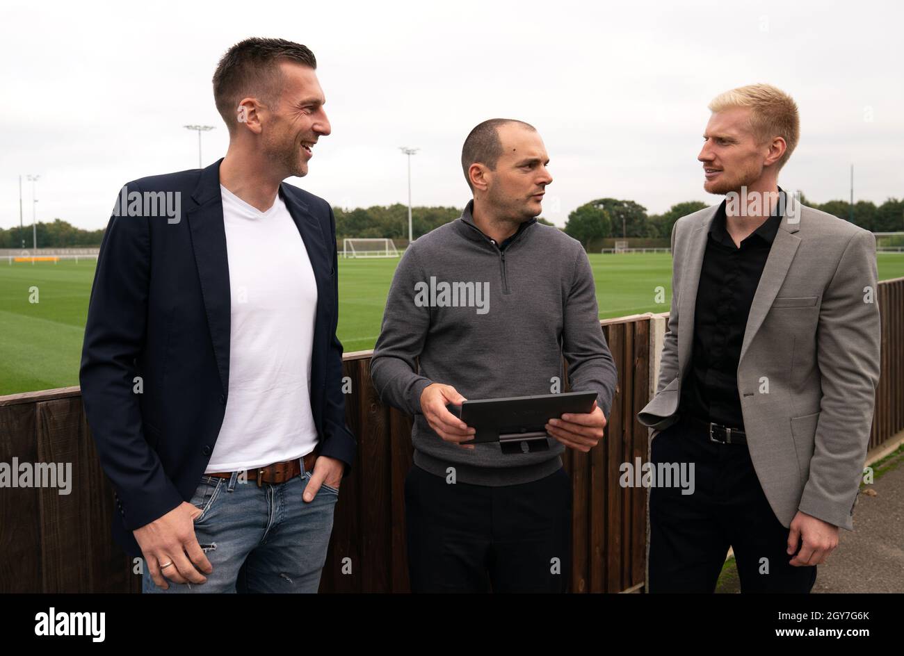 Norwich City sporting director Stuart Webber (centre) with Soccerbot ...