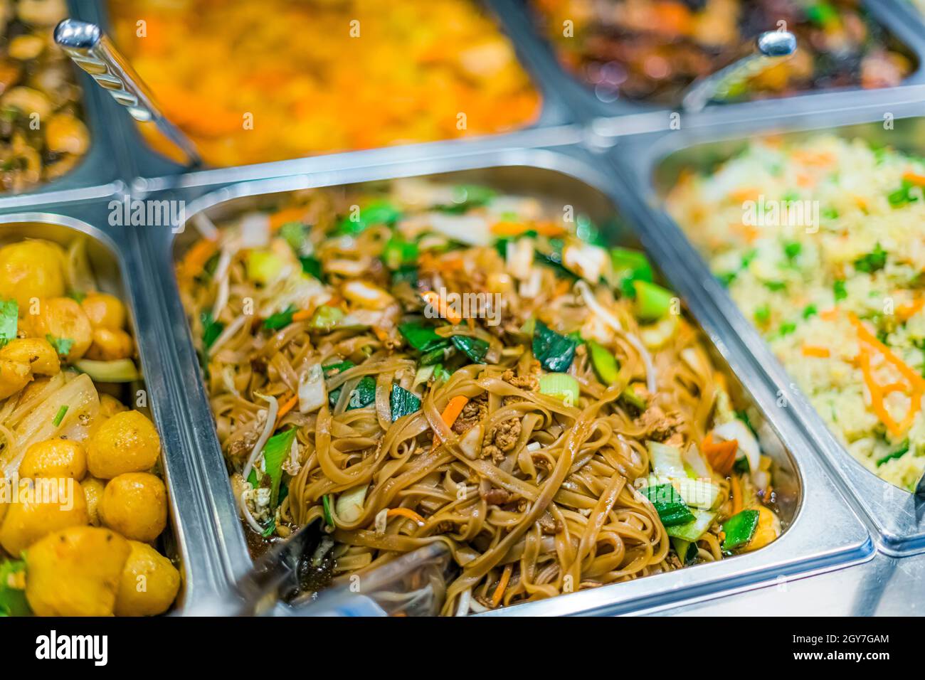 Traditional Asian food sold in an European shopping mall food court ...