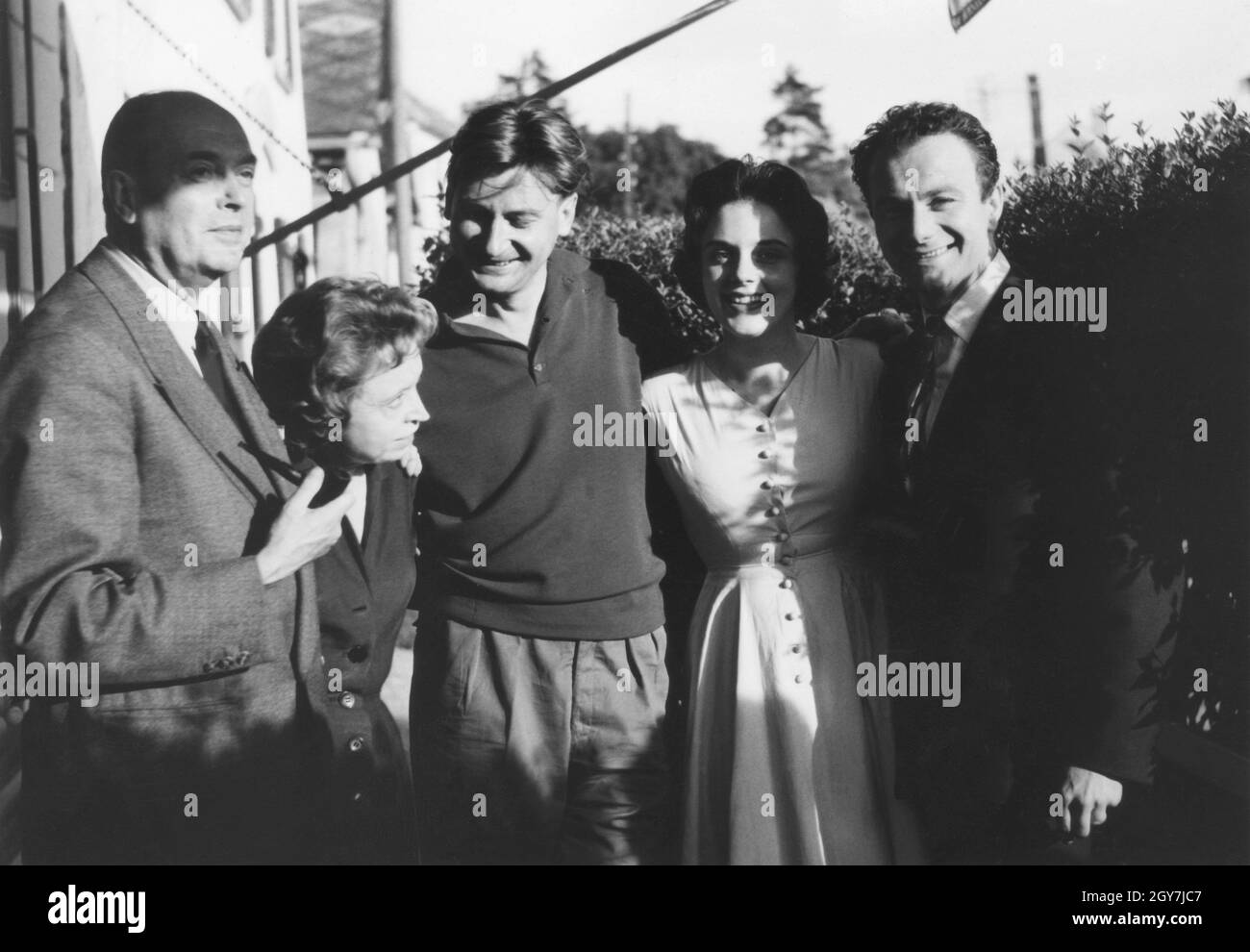 Filmmakers and cast on the set: the producer H . André Legrand , the ...