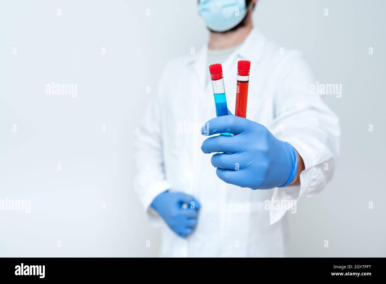 Research Scientist Comparing Different Samples, Doctor Displaying Cure ...