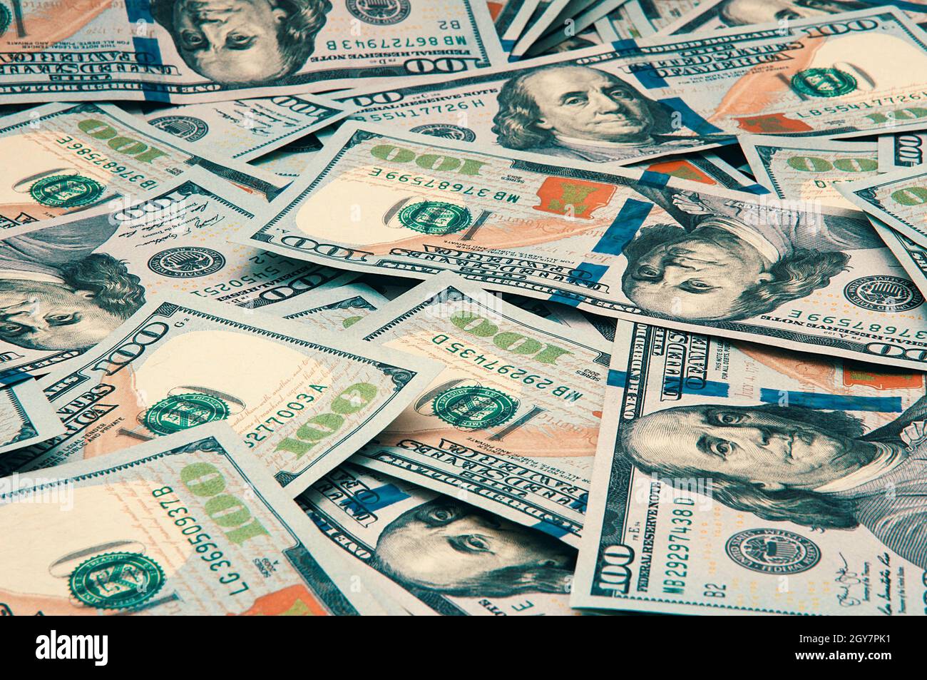 Cash hundred dollar bills, dollar background image. Scattered dollars ...