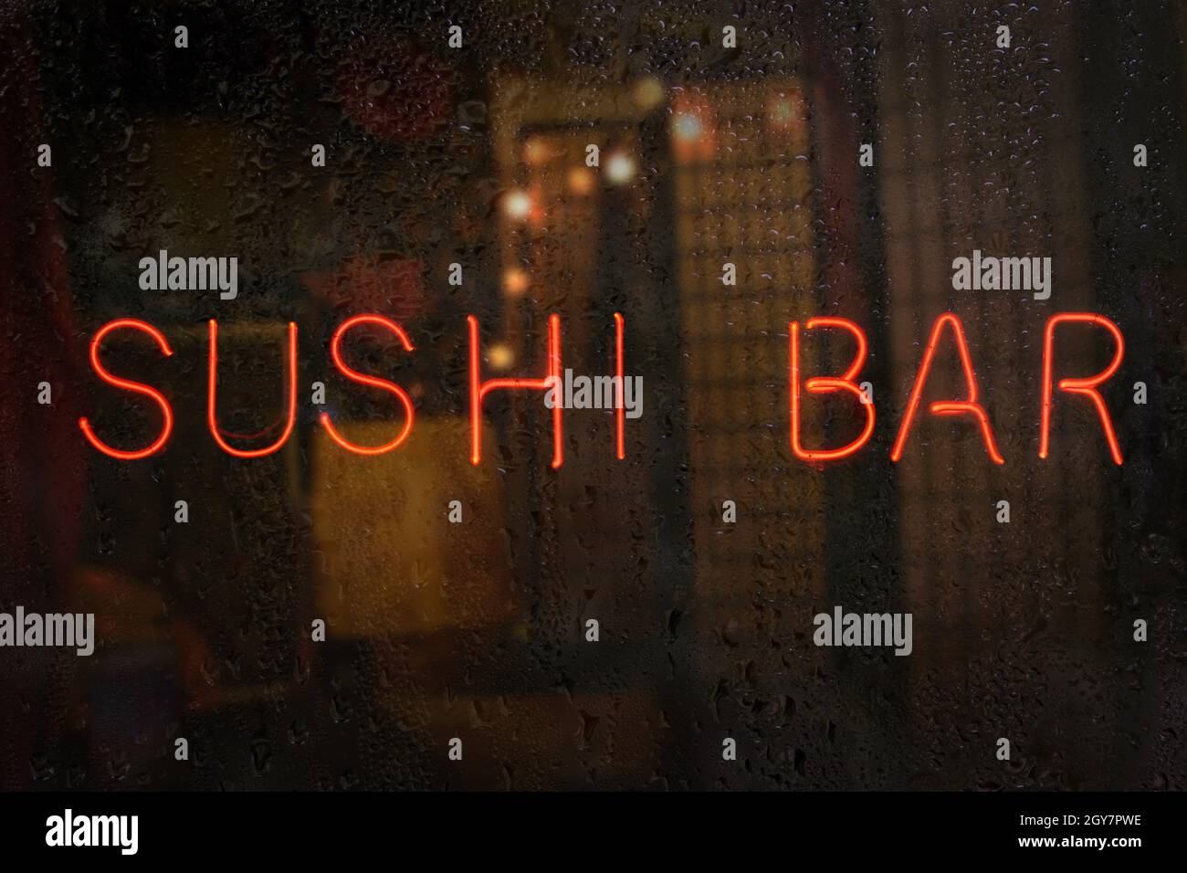 Vintage Neon Sushi Bar Sign in Wet Window Stock Photo - Alamy