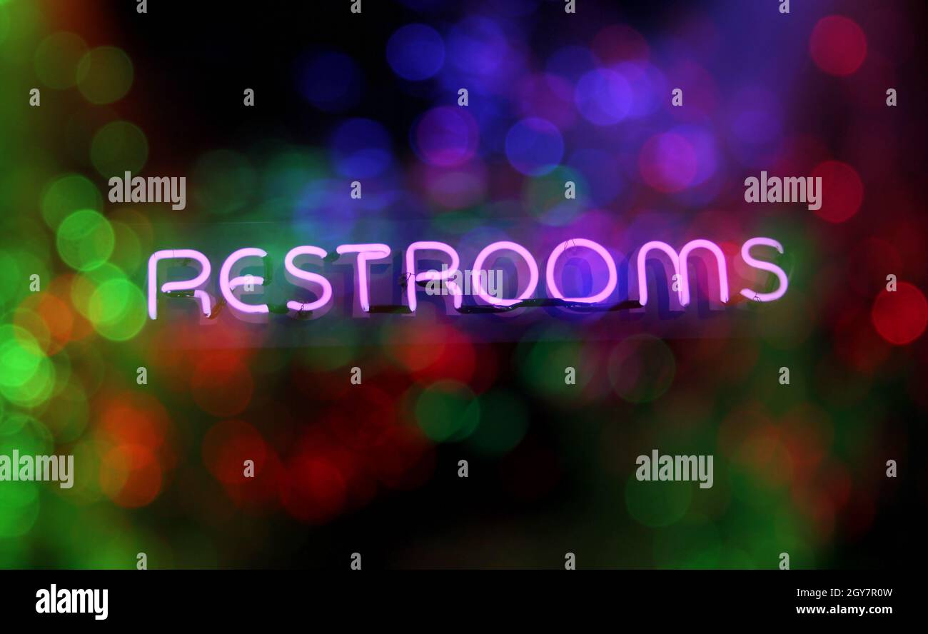 Neon Rainy Window Restroom Sign Stock Photo - Alamy