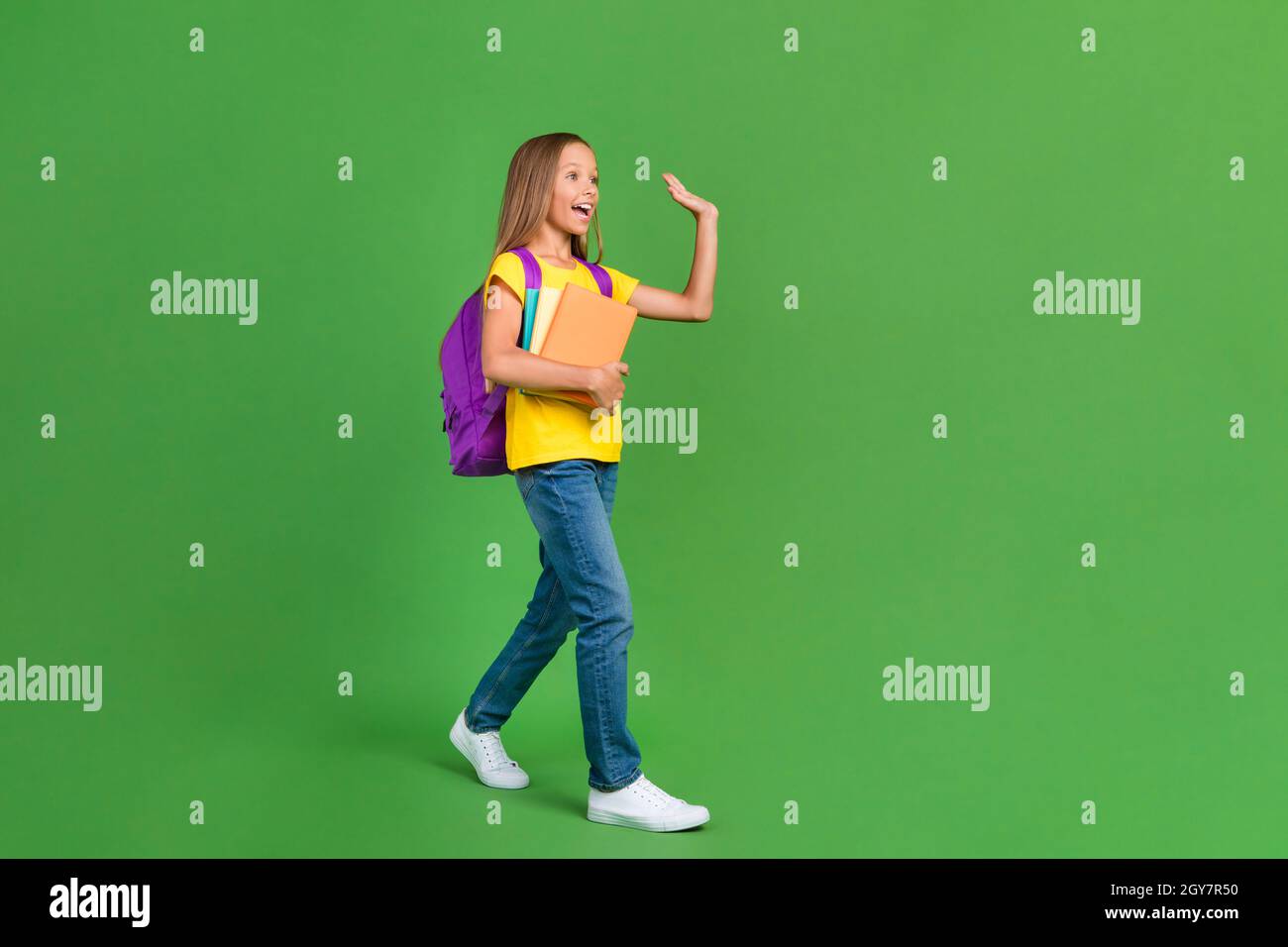 Full length body size view of pretty cheerful girl going to college ...