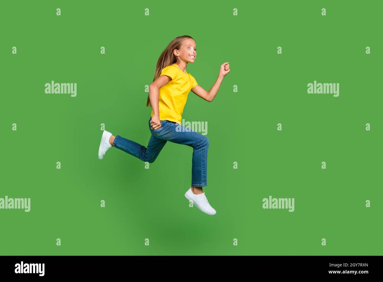 Full length body size view of attractive cheerful girl jumping running ...