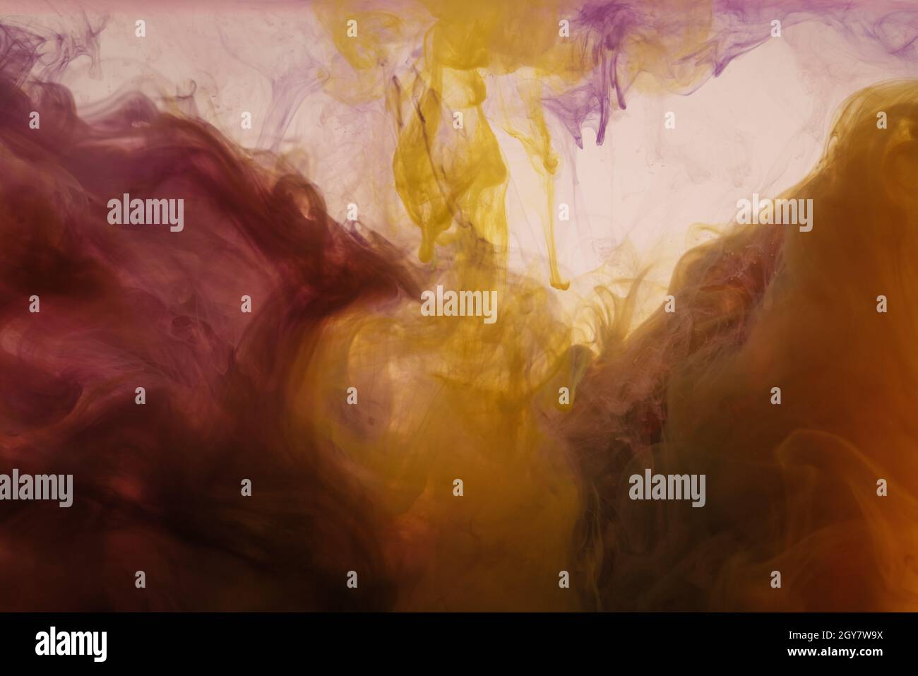 a liquid splash dissolve color Stock Photo - Alamy