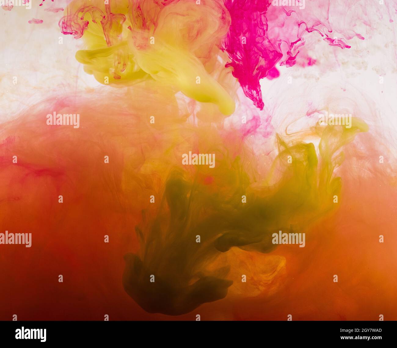 a liquid splash dissolve color Stock Photo - Alamy