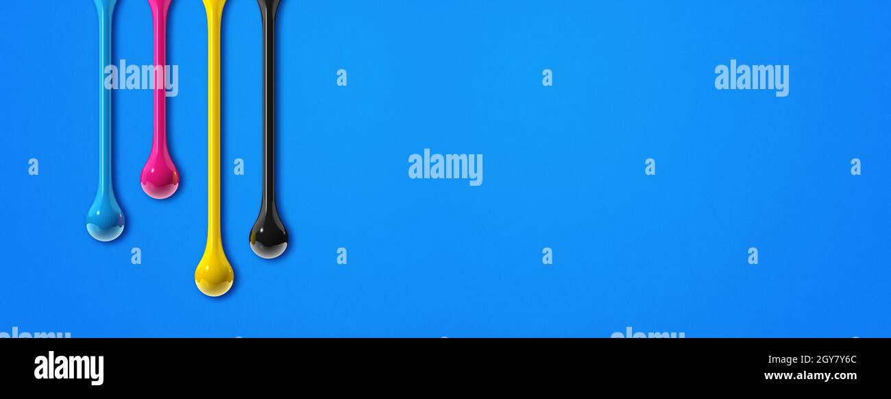 3D cmyk ink drops isolated on blue paper background. Horizontal banner ...
