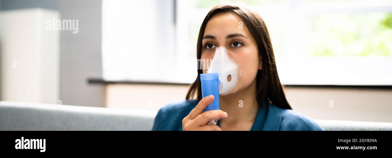 Asthma Patient Breathing Using Oxygen Mask And COPD Nebulizer Stock ...