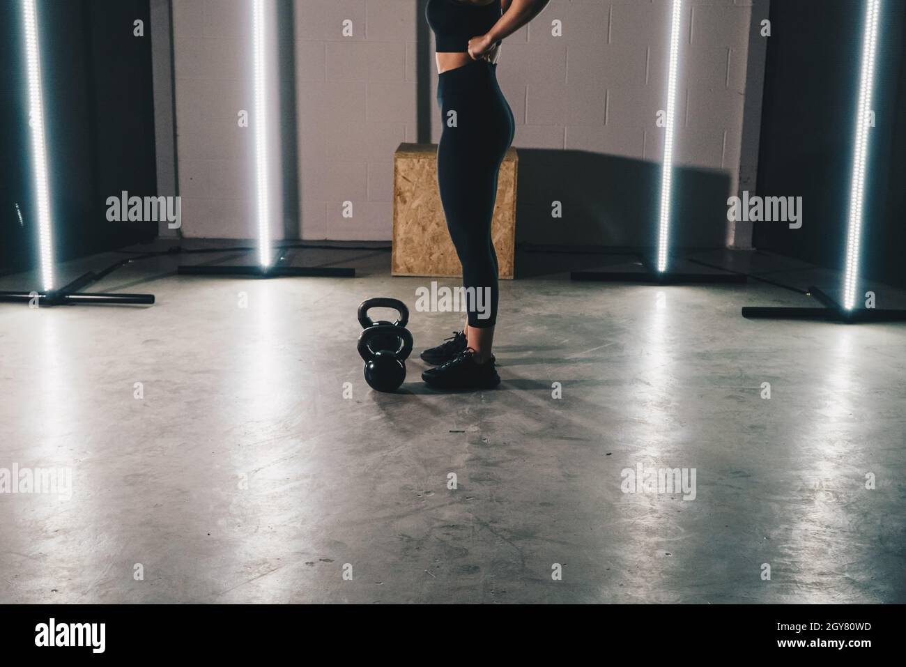 a crossfit athlete performing exercise in gym Stock Photo - Alamy