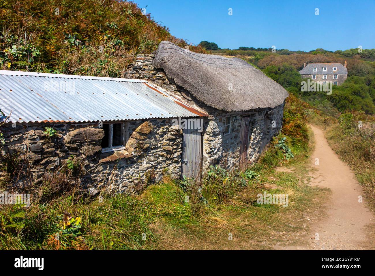 Thatched shed at Prussia Cove near Perranuthnoe on the South West Coast ...