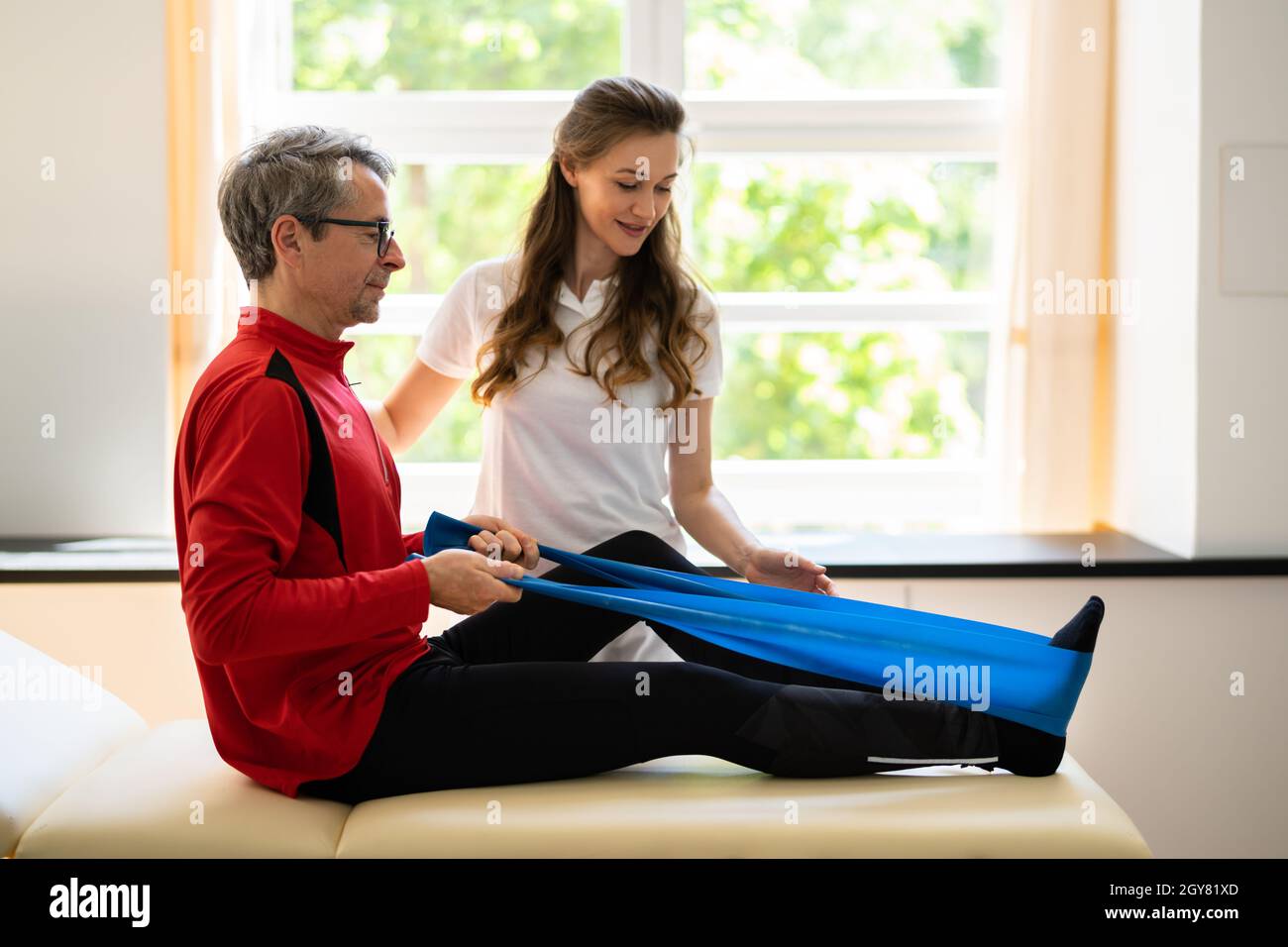 Band Therapy Rehab Exercise And Physio Training Stock Photo - Alamy