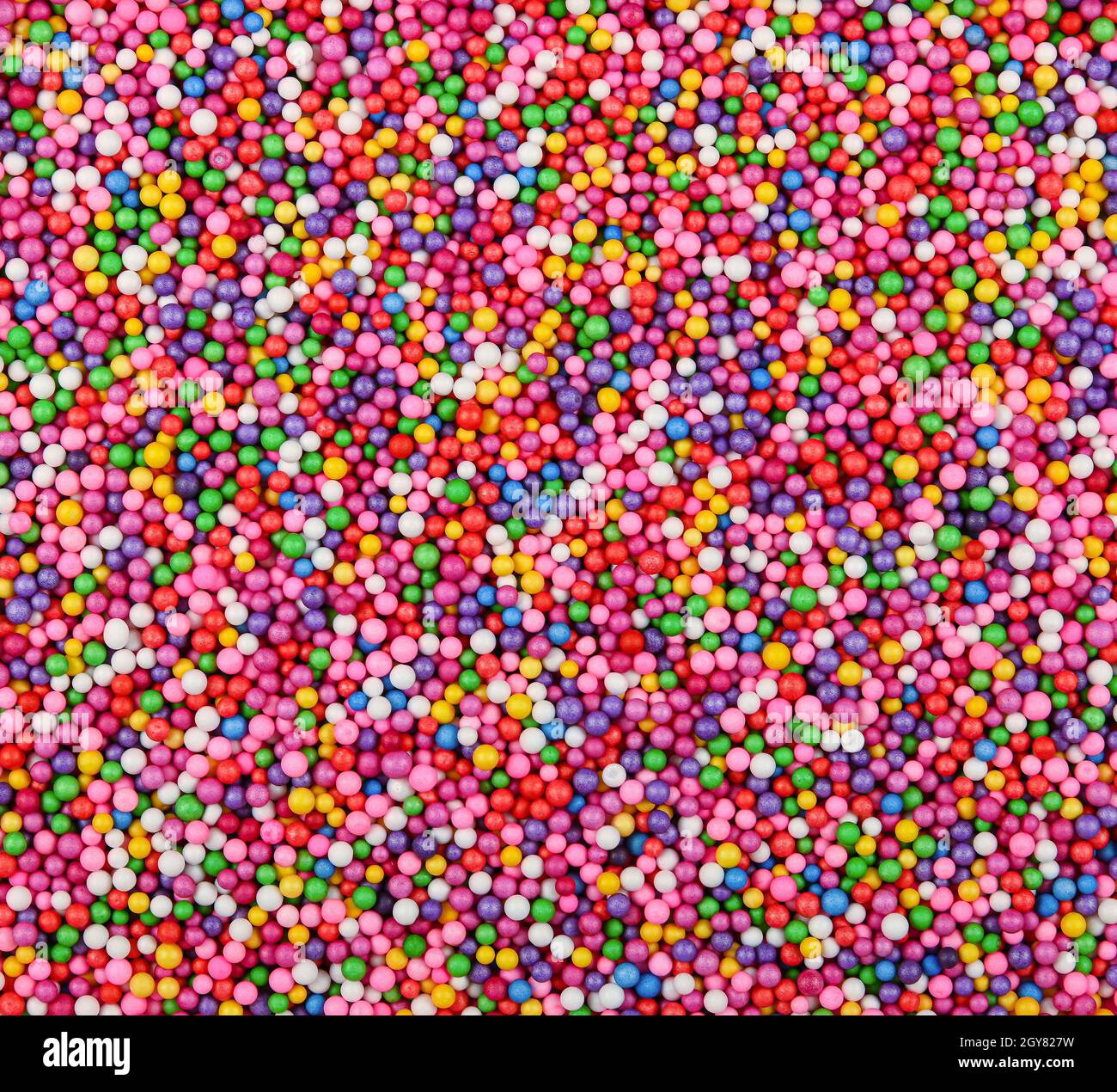 Abstract background texture of multicolor expanded polystyrene balls ...