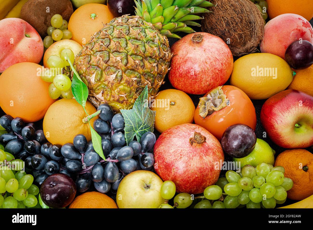 Assortment of colorful ripe tropical fruits. Top view Stock Photo - Alamy