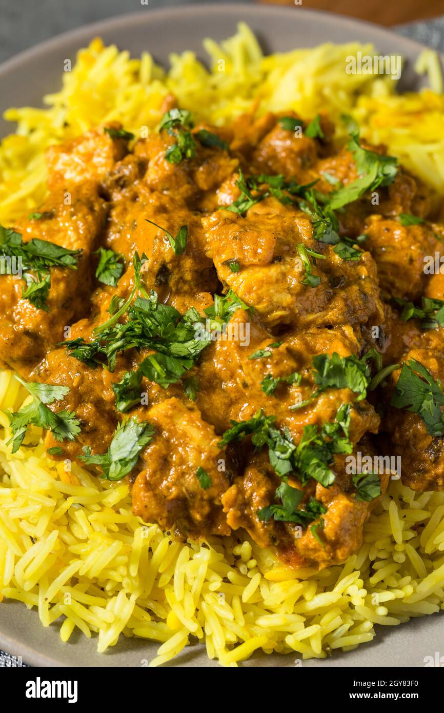 Homemade Indian Chicken Biryani with Yellow Rice Stock Photo - Alamy