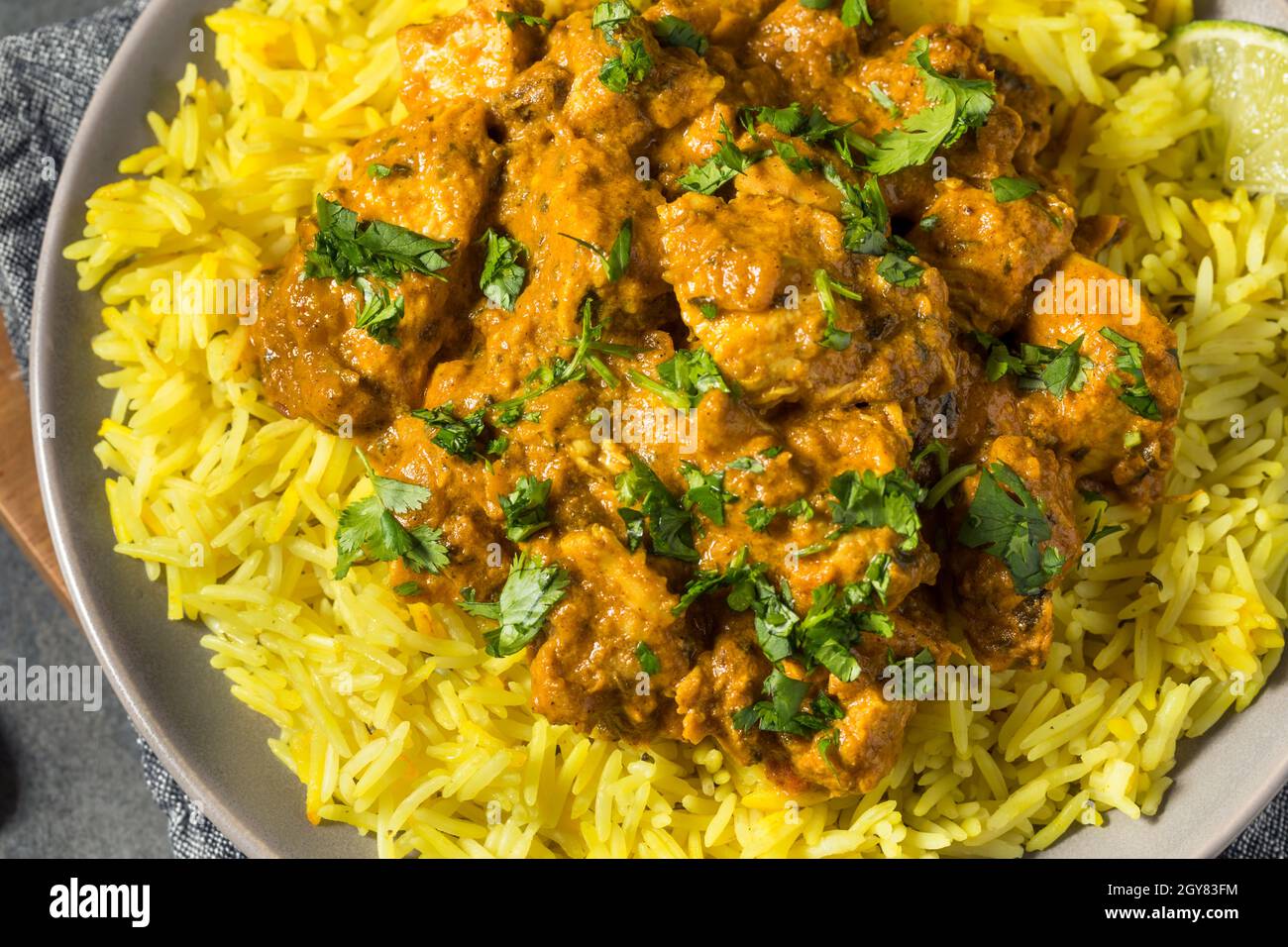 Homemade Indian Chicken Biryani with Yellow Rice Stock Photo - Alamy