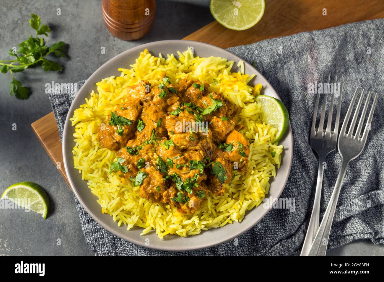 Homemade Indian Chicken Biryani with Yellow Rice Stock Photo - Alamy