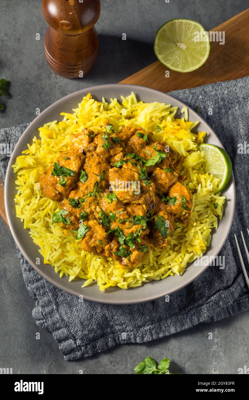 Homemade Indian Chicken Biryani with Yellow Rice Stock Photo - Alamy