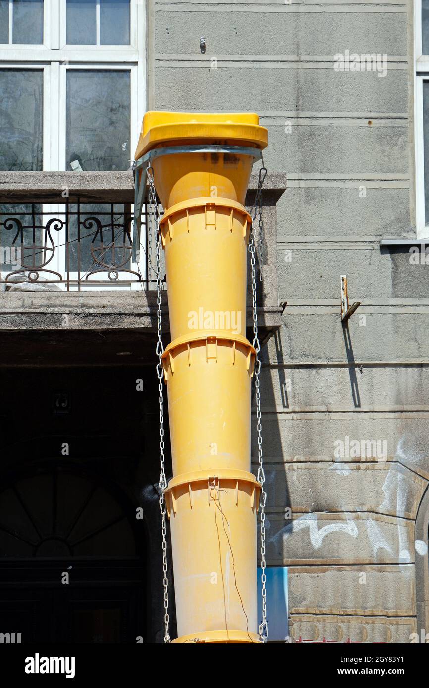 Debris chute used for cleaning large quantities of trash from buildings ...