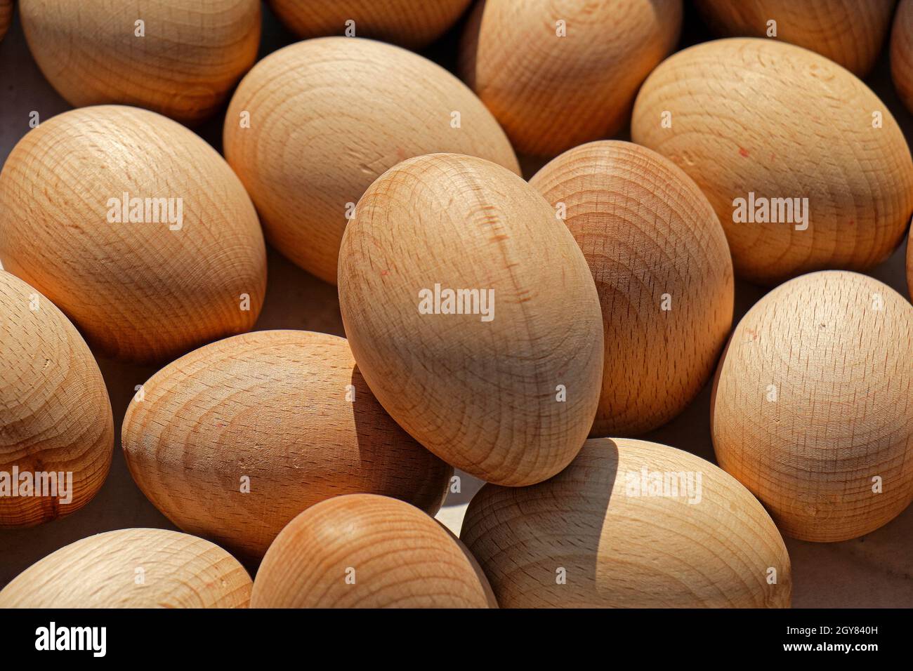 Wooden eggs pile for crafts and Easter decorations Stock Photo - Alamy