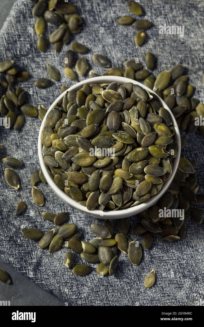 Healthy Organic Raw Pumpkin Seed Pepitas in a Bowl Stock Photo - Alamy