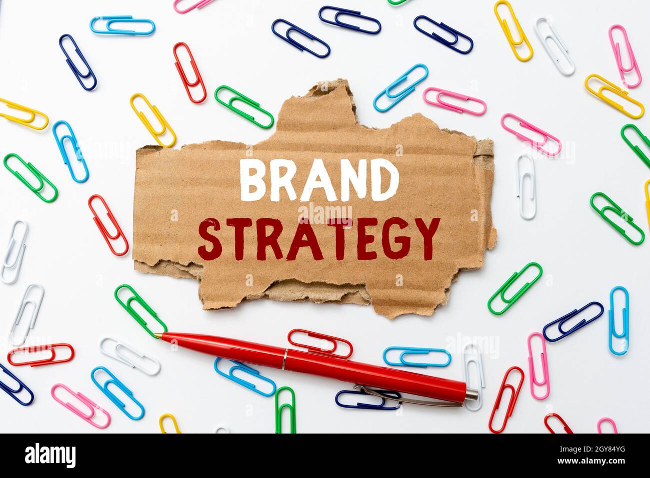 Sign displaying Brand Strategy, Word Written on longterm plan executed ...