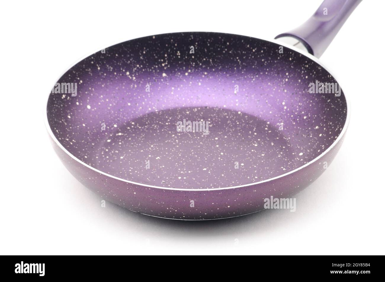 Frying pan on an isolated white background Stock Photo - Alamy