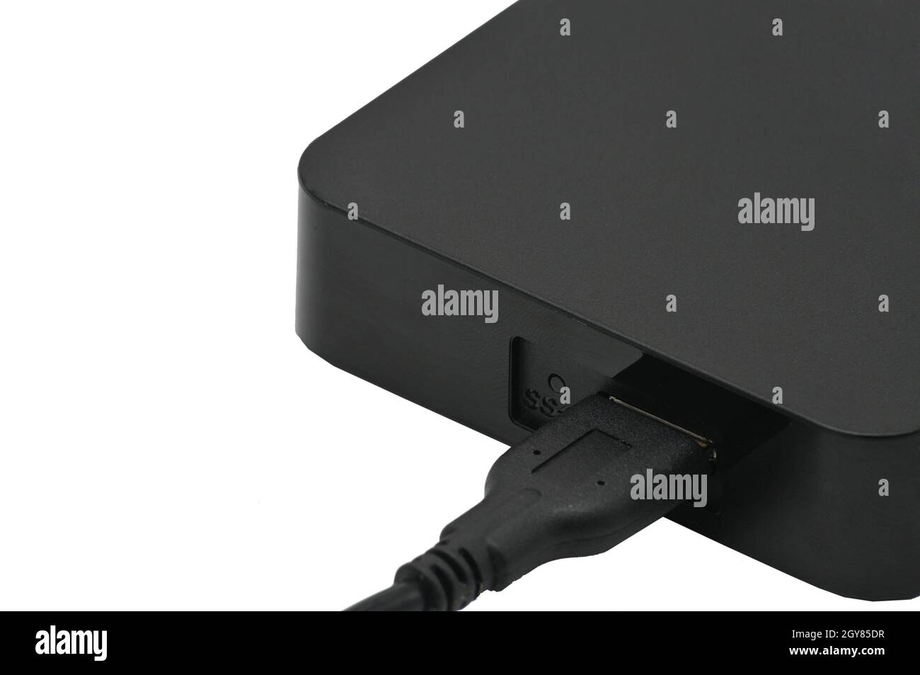 Portable hard drive for backing up various files on an isolated white ...